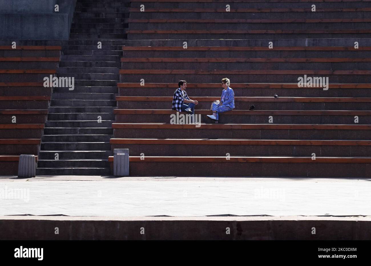 People talk on a street in the downtown of Kyiv, Ukraine 23 September ...