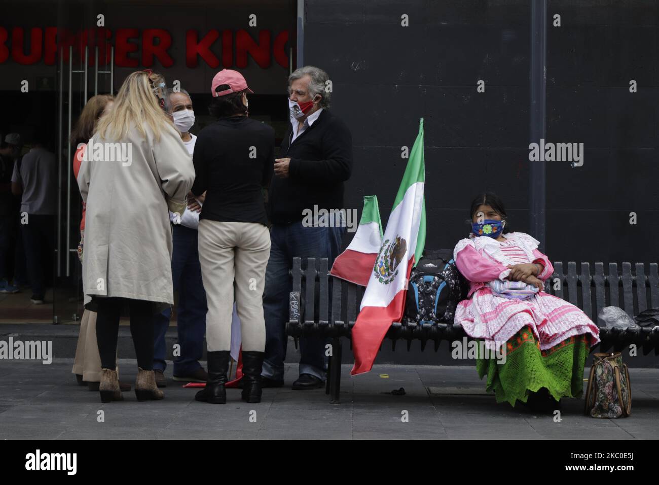 Members of the National Anti-AMLO Front commissioned flags from a woman ...