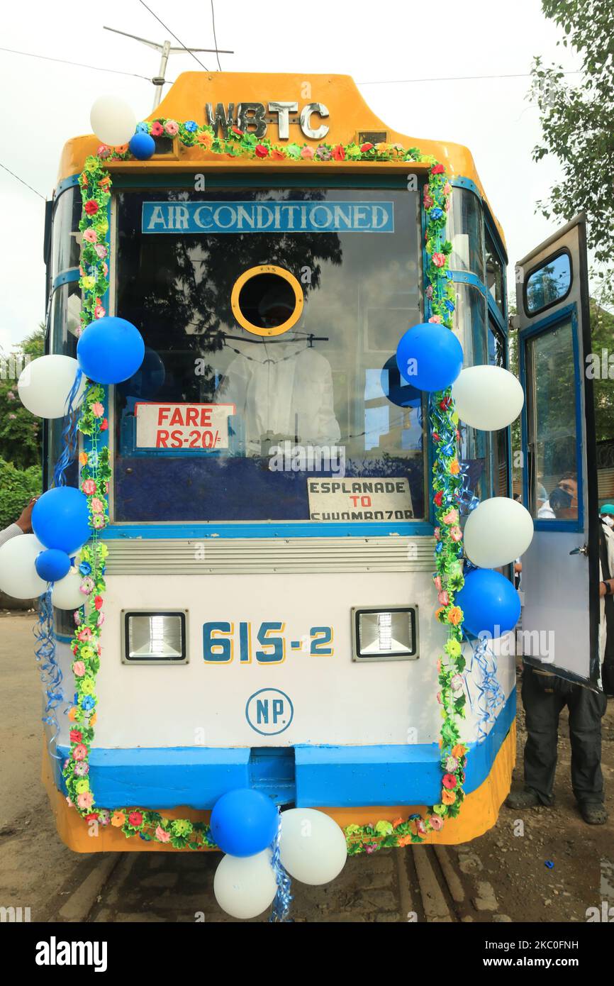 Tram driver wearing conductor wearing a protective suit during the ...
