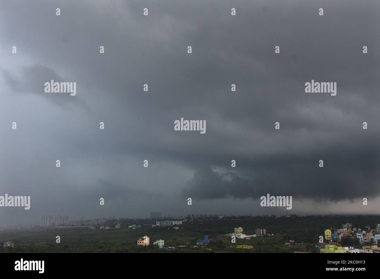 Depression rain cloud looming in the sky before downpour as commuter ...