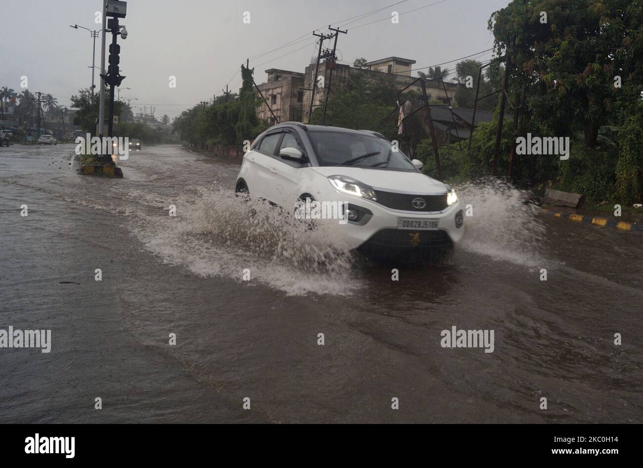 Depression rain cloud looming in the sky before downpour as commuter ...