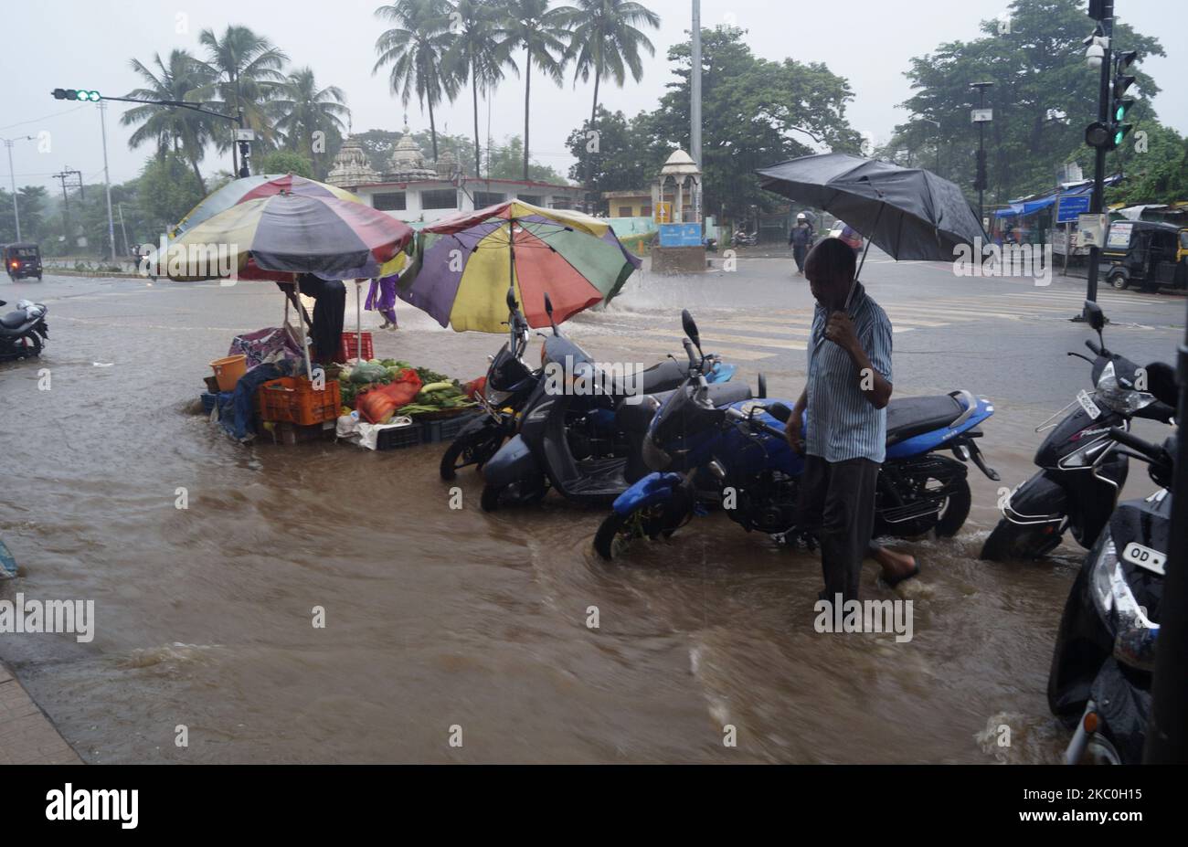 Depression rain cloud looming in the sky before downpour as commuter ...