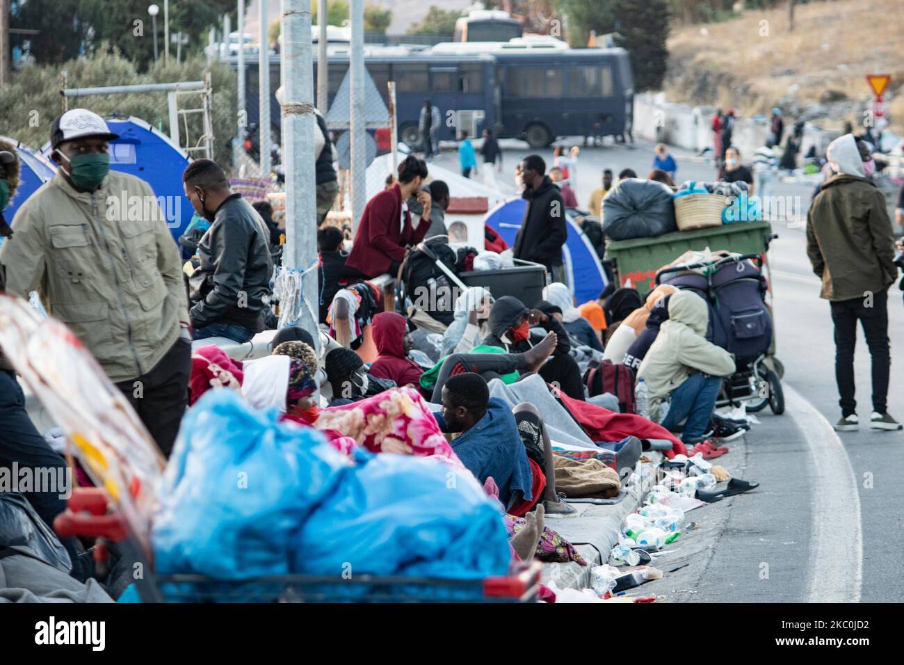 Refugee girl sleeping on street hi-res stock photography and images - Alamy