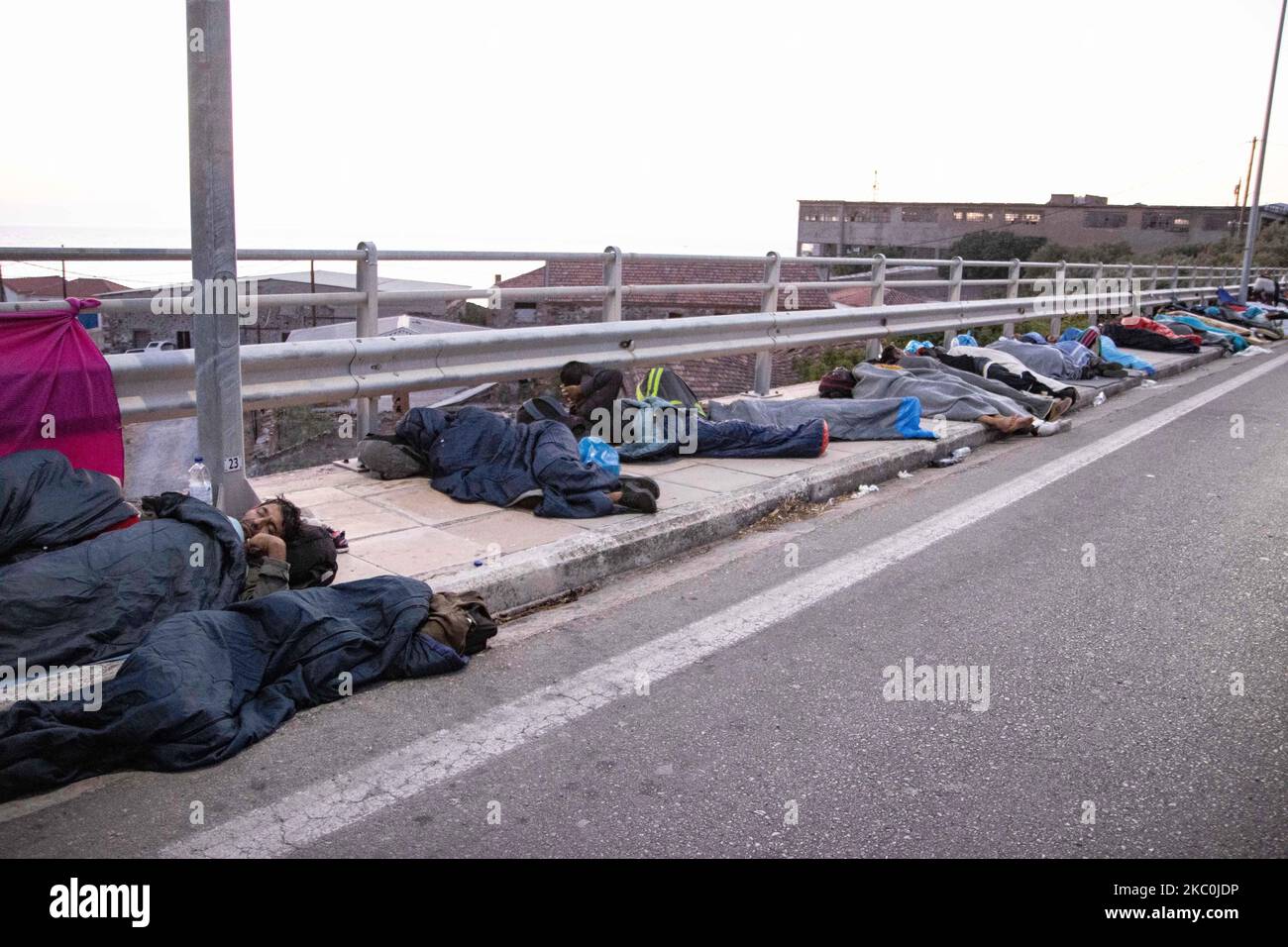 Refugee girl sleeping on street hi-res stock photography and images - Alamy