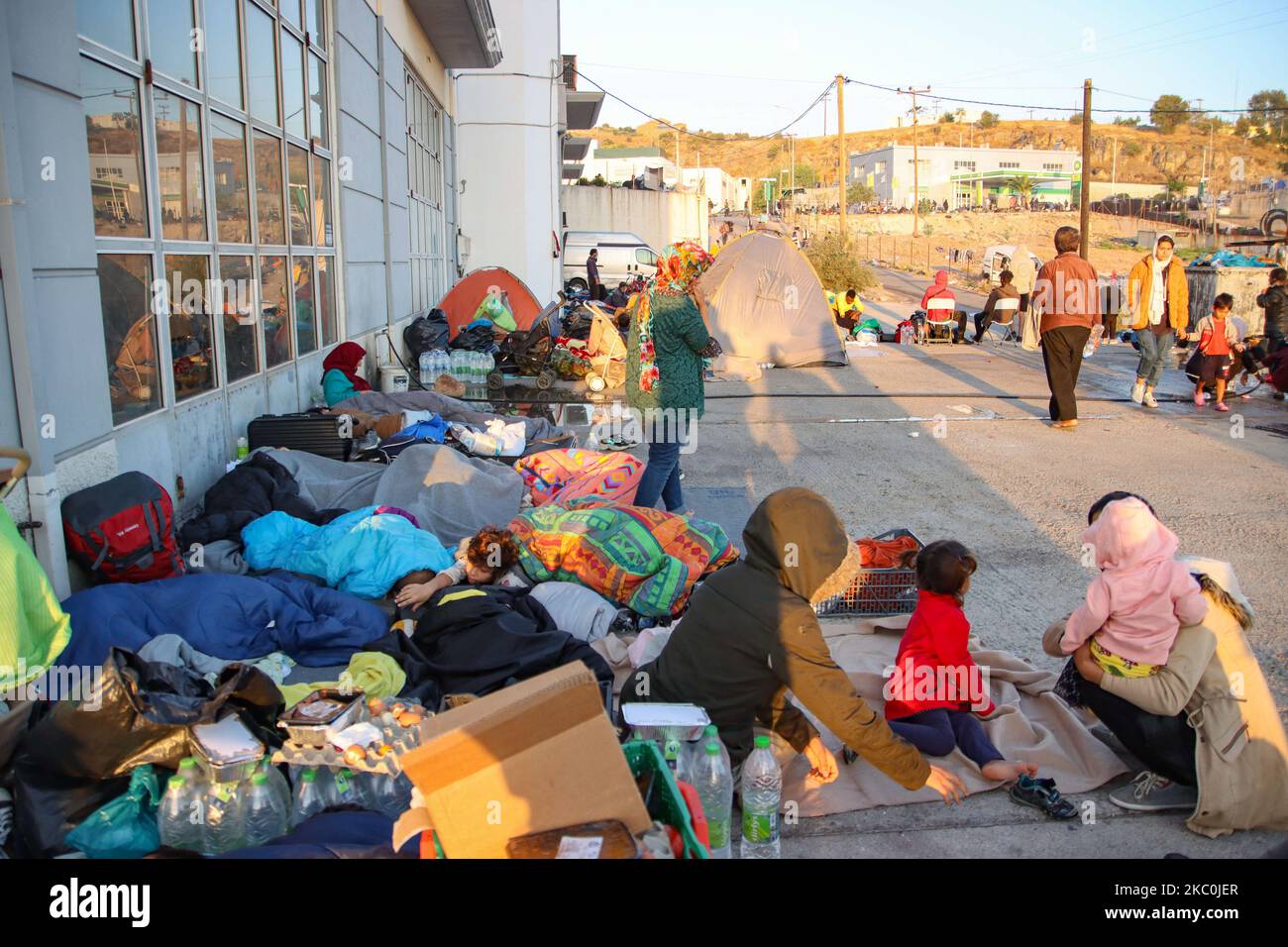 Refugee girl sleeping on street hi-res stock photography and images - Alamy