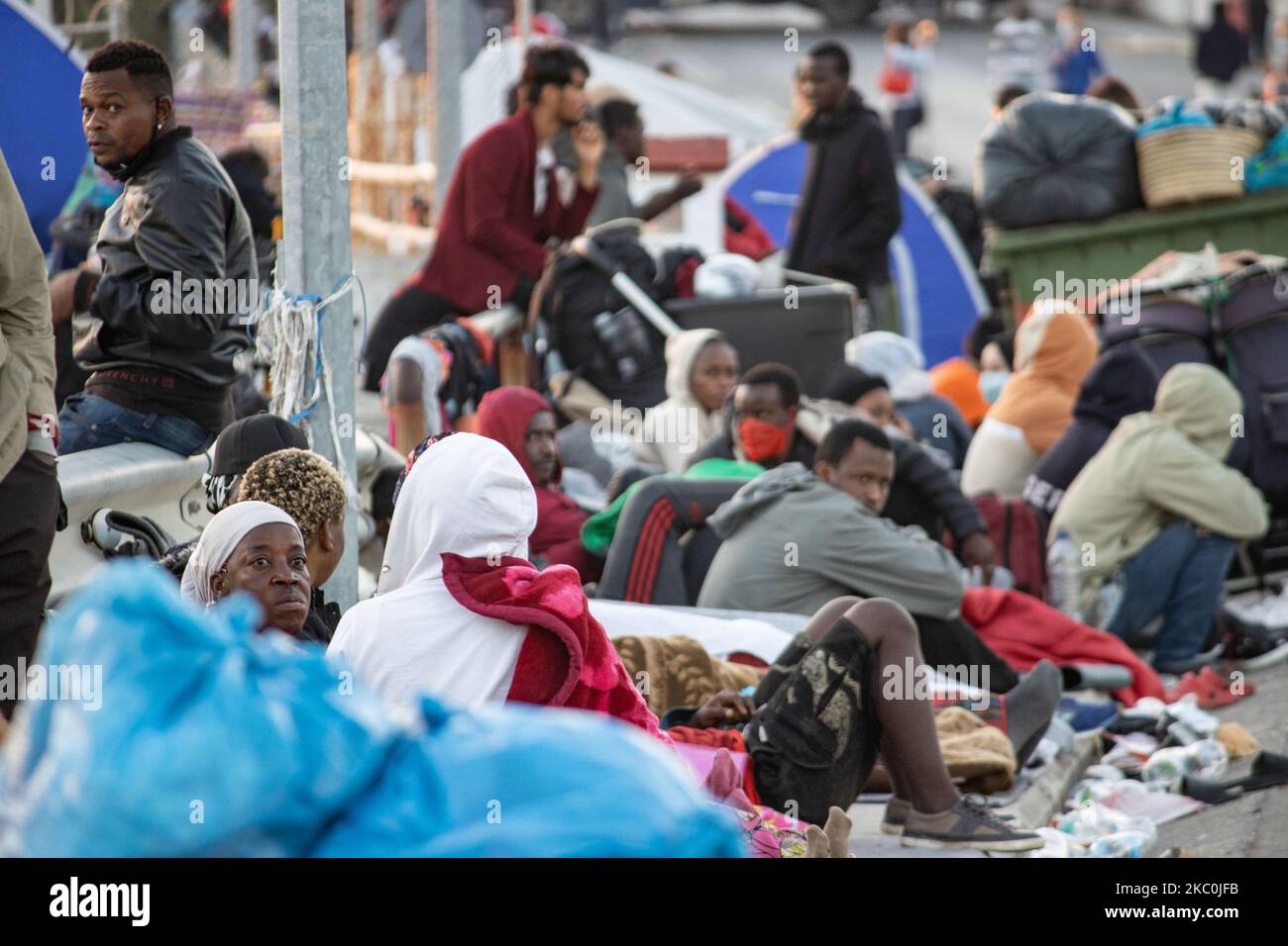 Refugee girl sleeping on street hi-res stock photography and images - Alamy