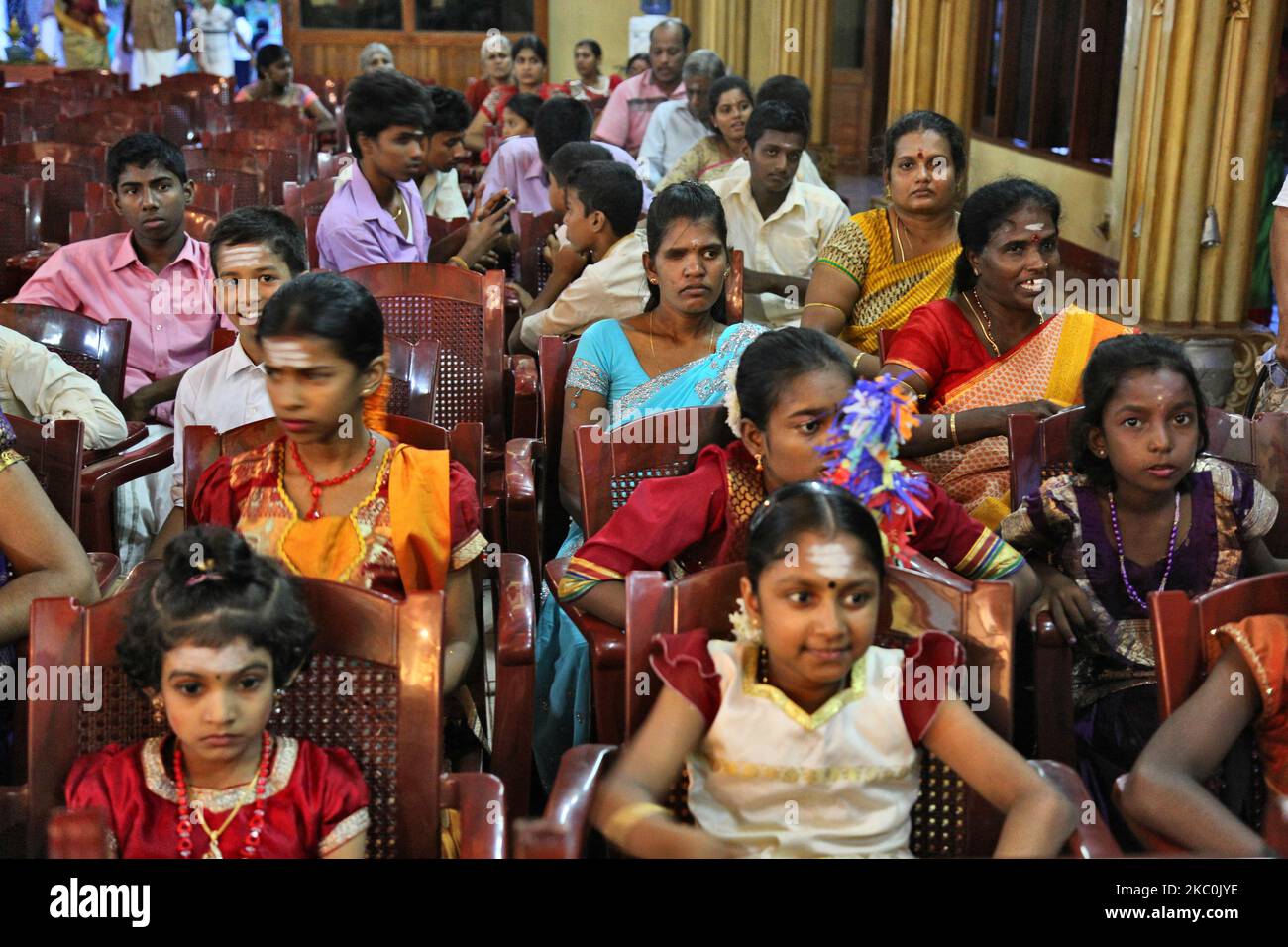 Tamil children wait to perform in a special cultural program featuring ...