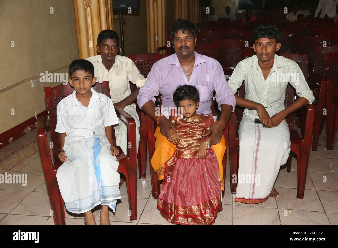 Tamil Hindus watch as Tamil children who were orphaned during the civil ...