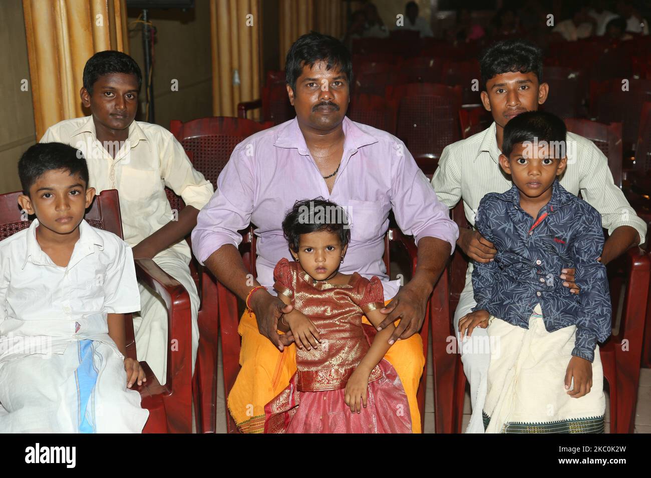 Tamil Hindus watch as Tamil children who were orphaned during the civil ...