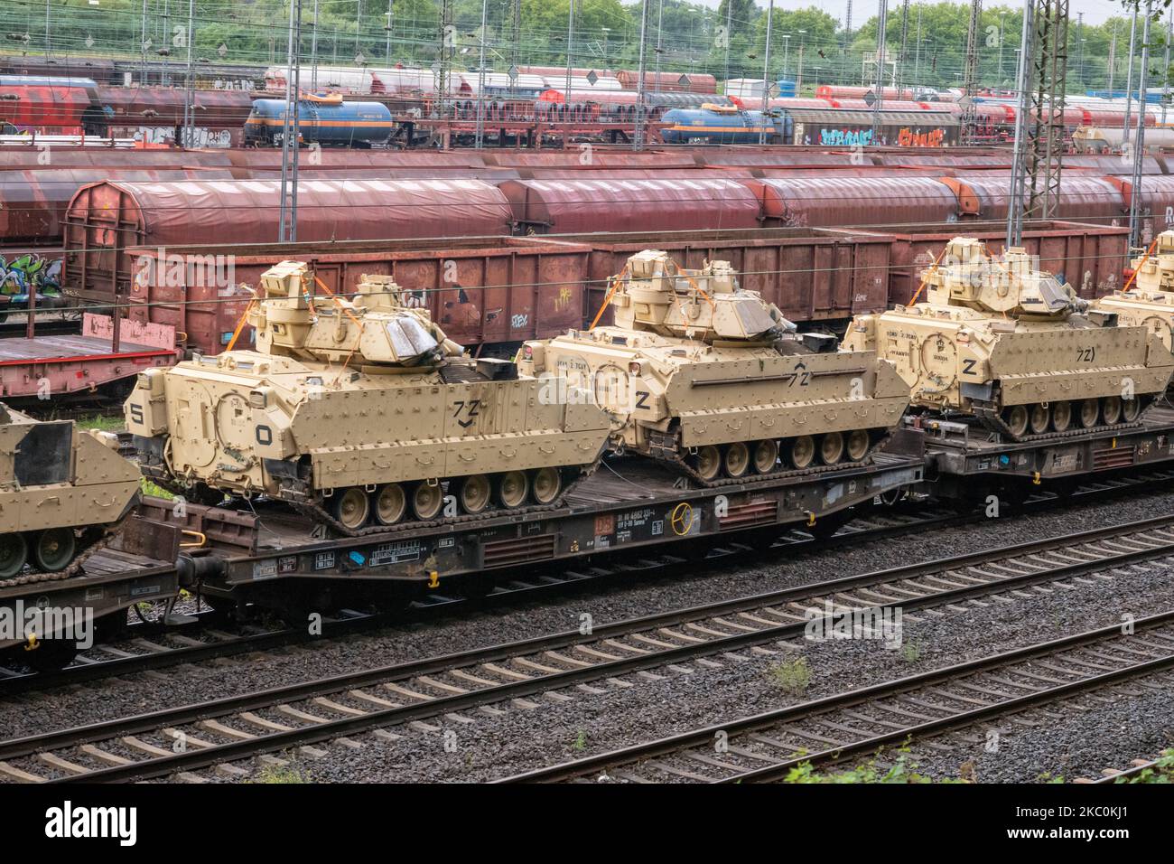 The federal railway with military tanks on freight wagons in Germany ...