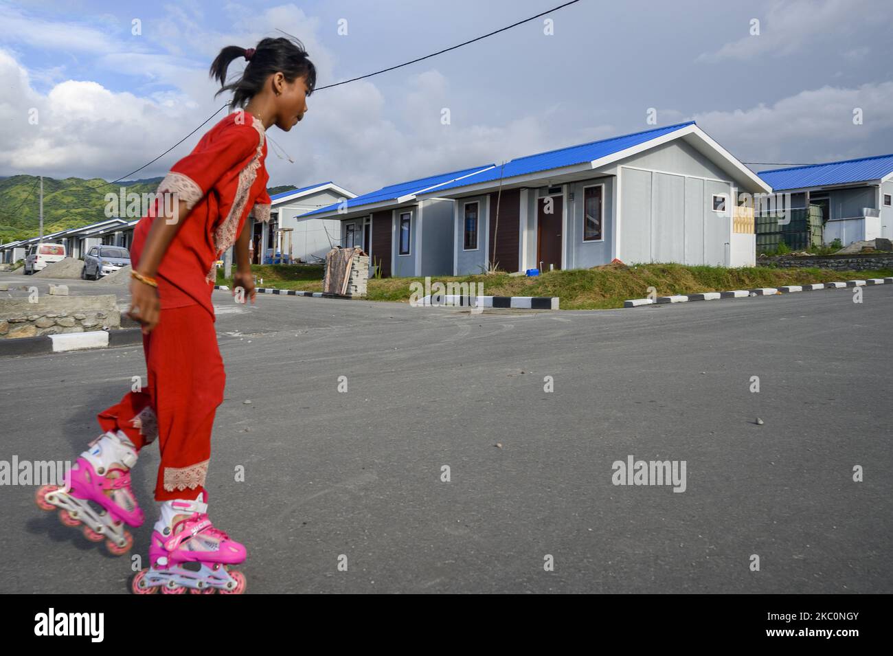 A child skates playing in a permanent residential complex for disaster ...