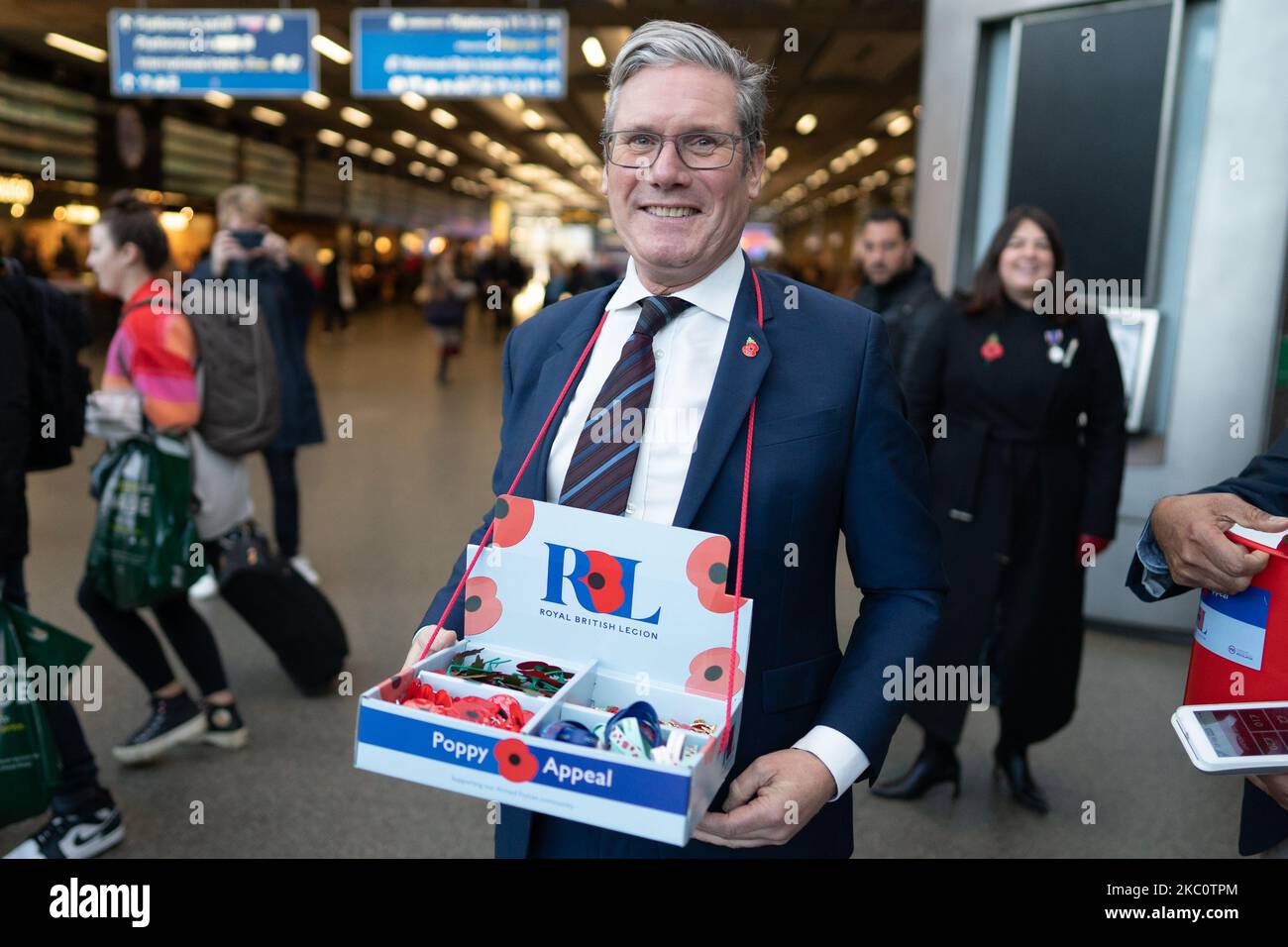 Labour leader Sir Keir Starmer helps out with selling poppies at London ...