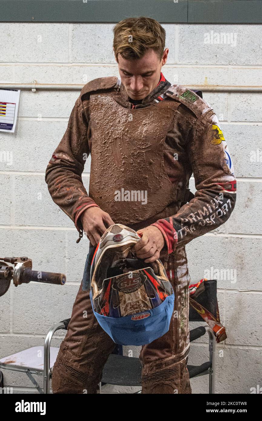 Steve Worrall cleans his helmet during the British Speedway ...