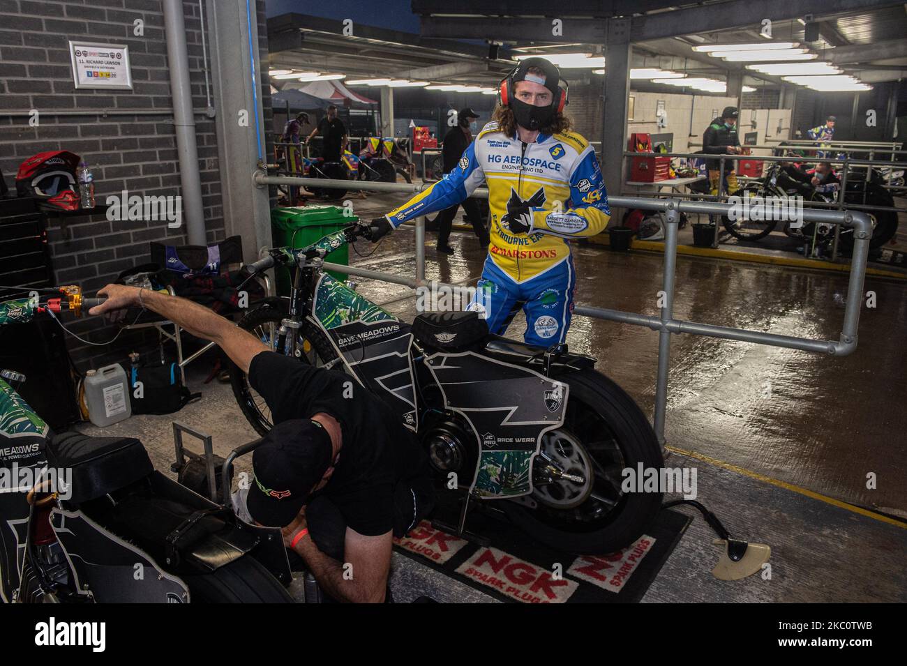 Richard Lawson warms up his bike during the British Speedway ...
