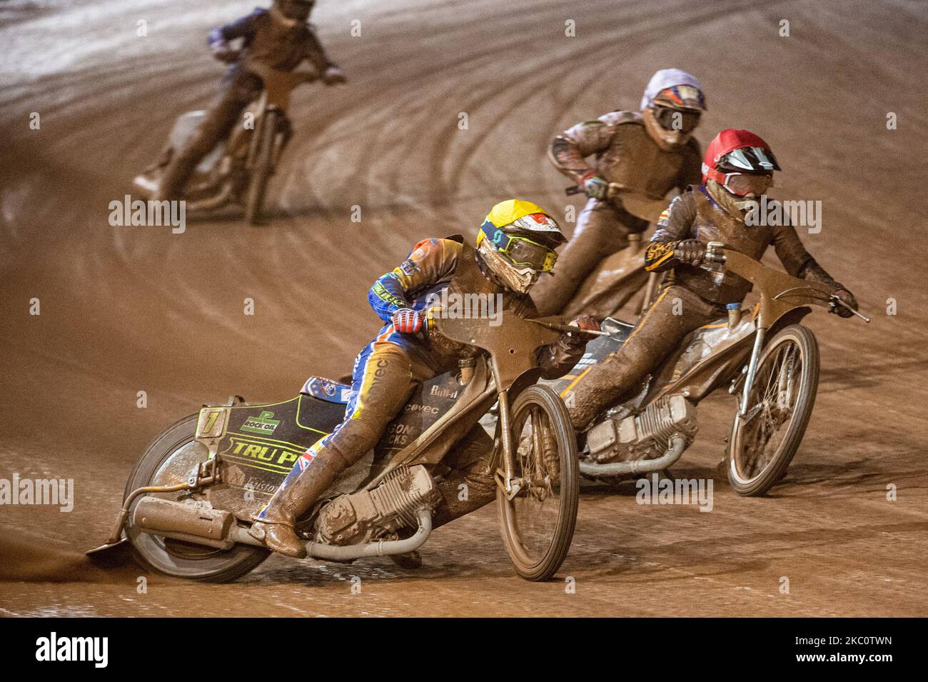Jason Crump (Yellow) leads Ben Barker (Red) Steve Worrall (White) and ...