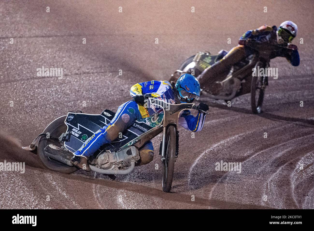 Richard Lawson (Blue) leads Jason Crump (White) during the British ...
