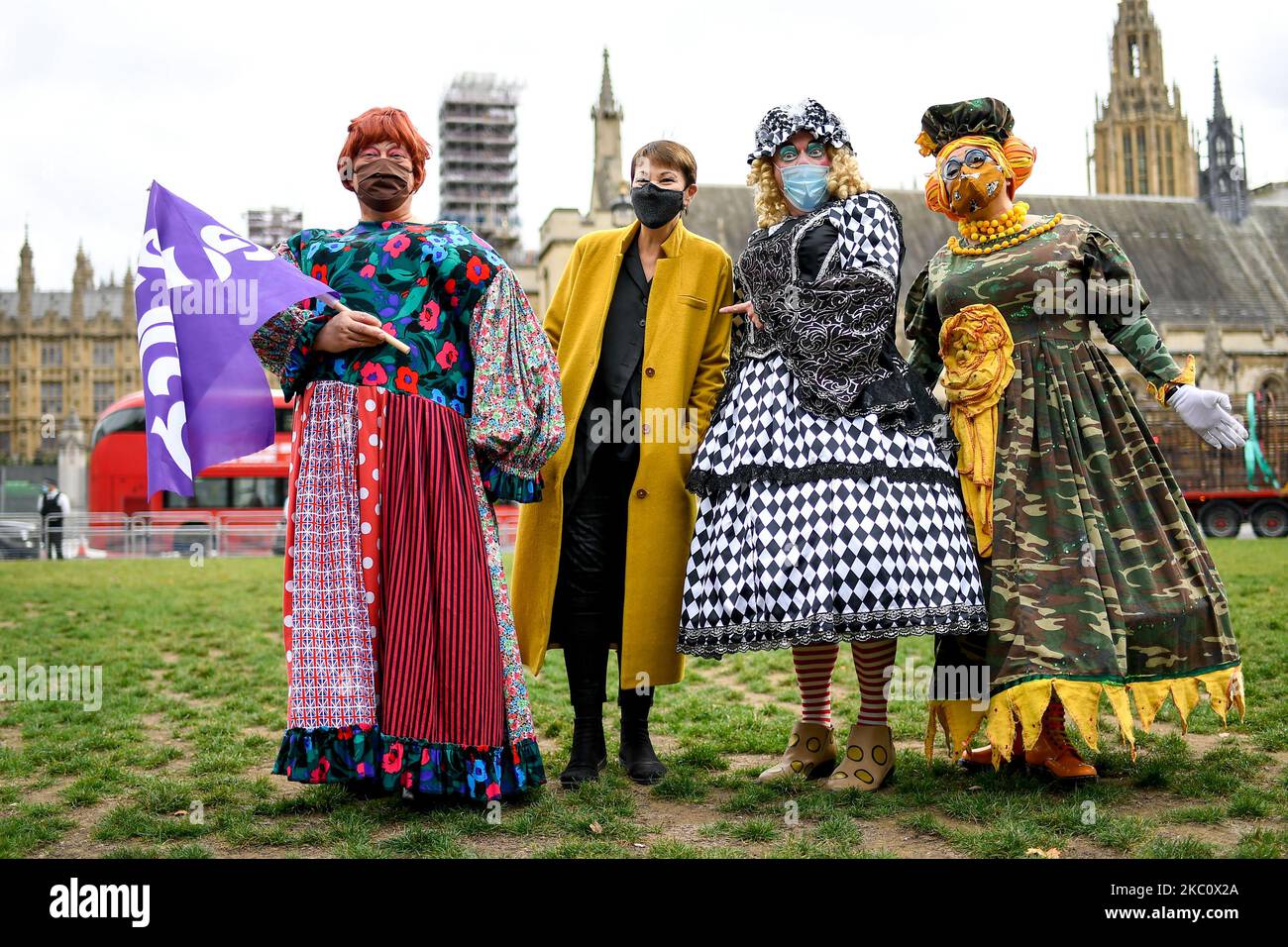 Pantomime dames and Green Party MP Caroline Lucas (2 left) pose in ...