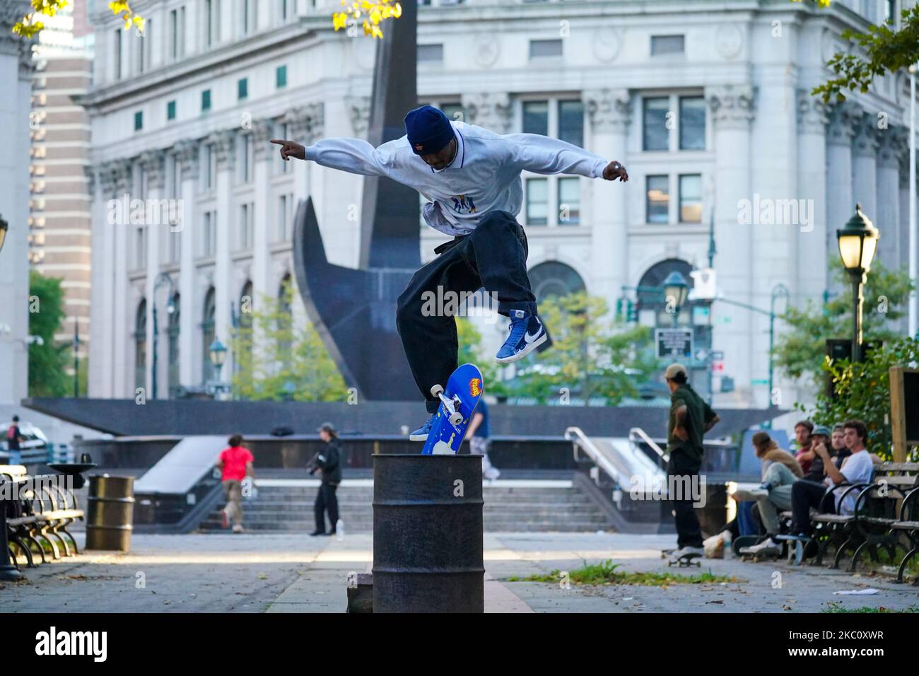 People practice their skateboarding skills at Foley Square Park as New ...
