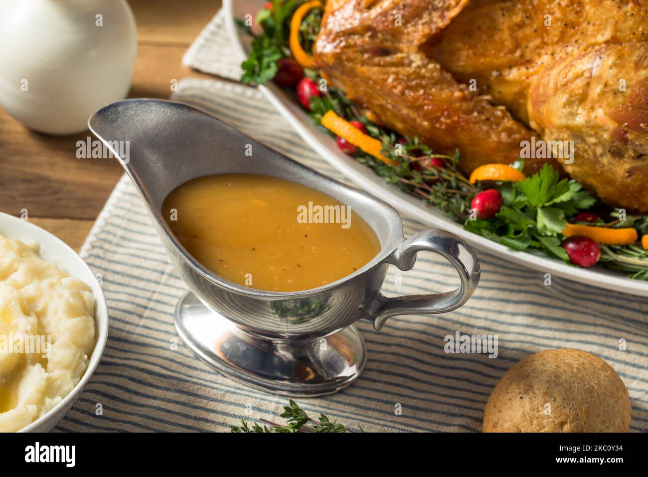 Homemade Thanksgiving Turkey Gravy in a Boat Stock Photo - Alamy