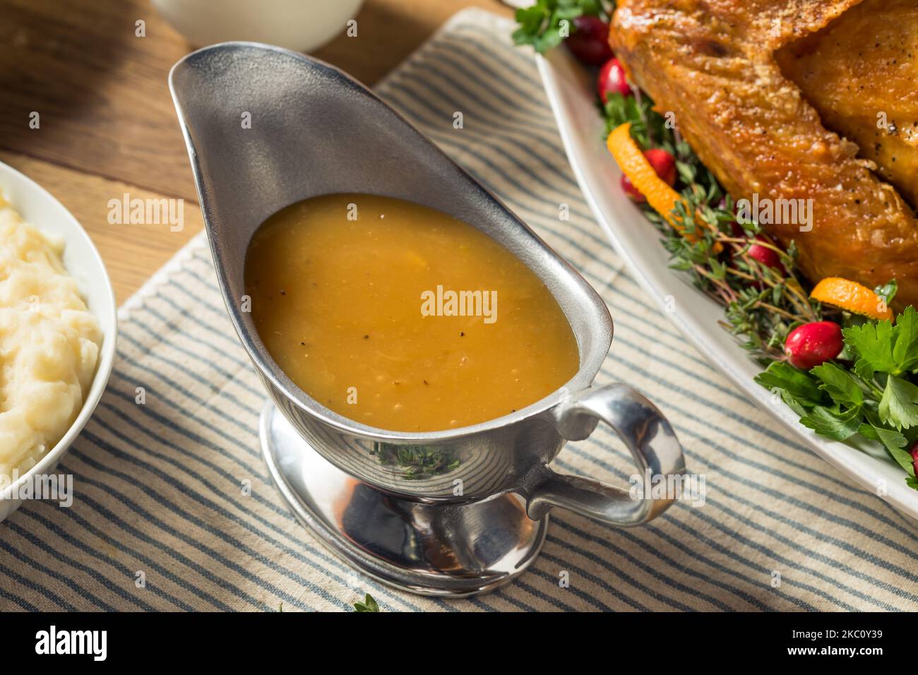 Homemade Thanksgiving Turkey Gravy in a Boat Stock Photo - Alamy