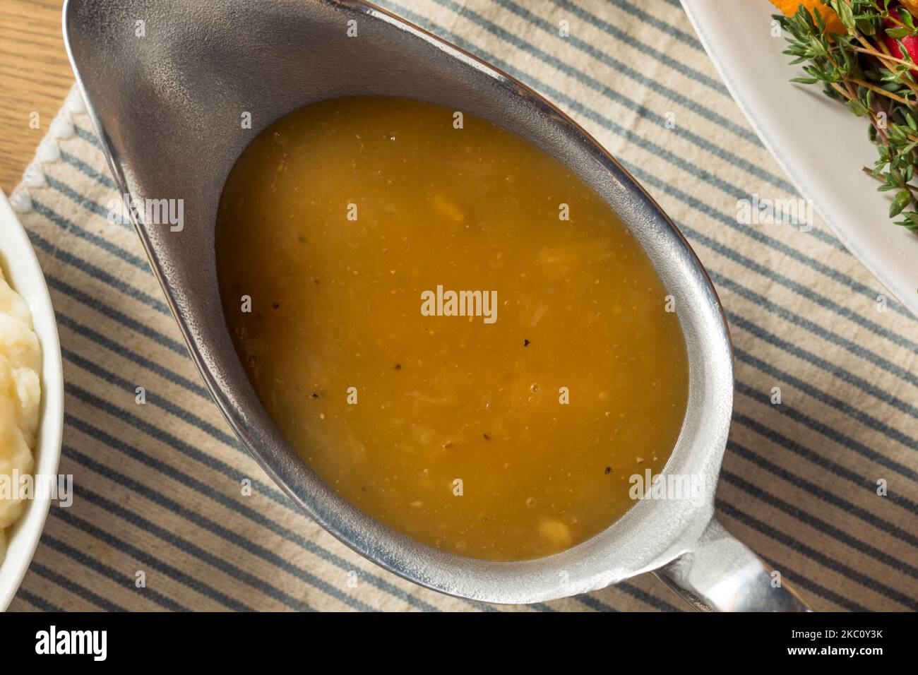 Homemade Thanksgiving Turkey Gravy in a Boat Stock Photo - Alamy