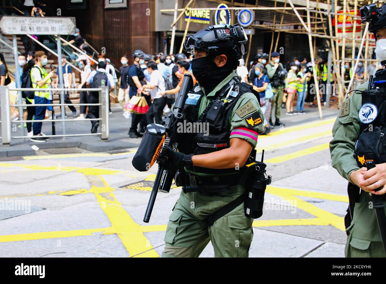 Riot police on standby during street demonstrations in Hong Kong, China ...