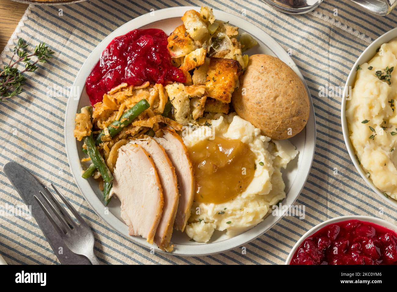 Homemade Thanksgiving Turkey Dinner with Potatoes Gravy Cranberry and ...