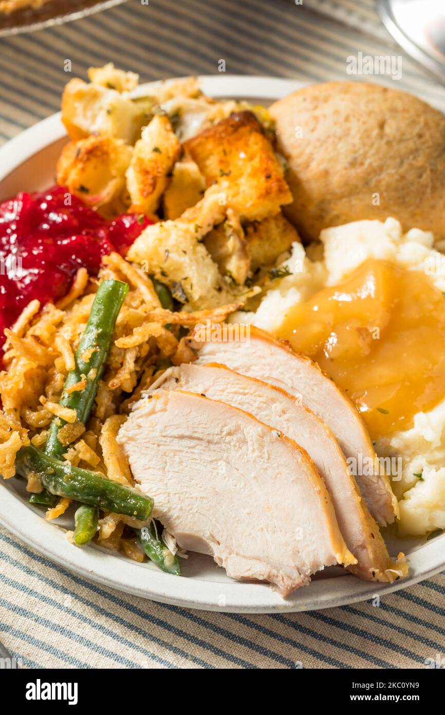 Homemade Thanksgiving Turkey Dinner with Potatoes Gravy Cranberry and ...