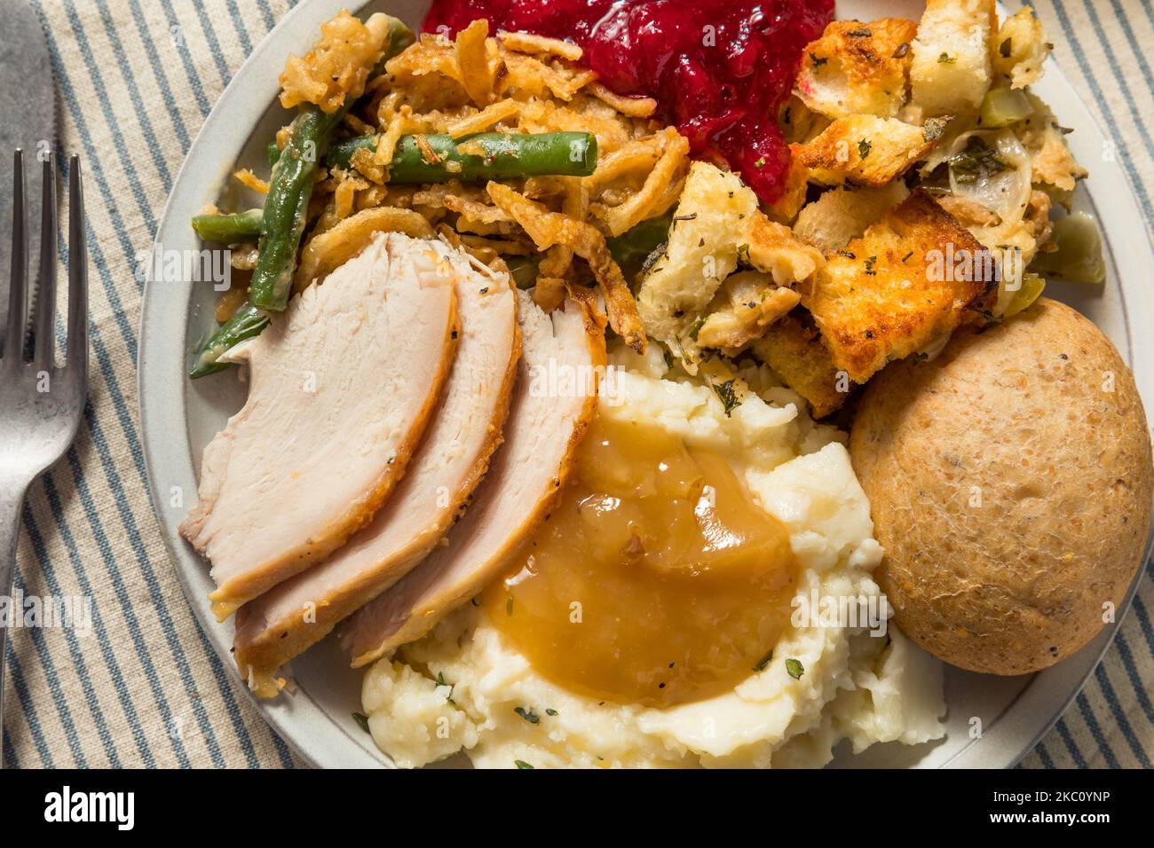 Homemade Thanksgiving Turkey Dinner with Potatoes Gravy Cranberry and ...