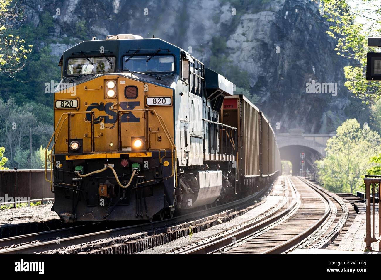 A CSX Rock train exiting the tunnel at Harpers Ferry Stock Photo - Alamy