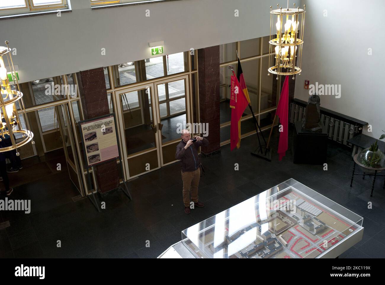 Visitors look at exhibits of Stasi surveillance post to show what ...