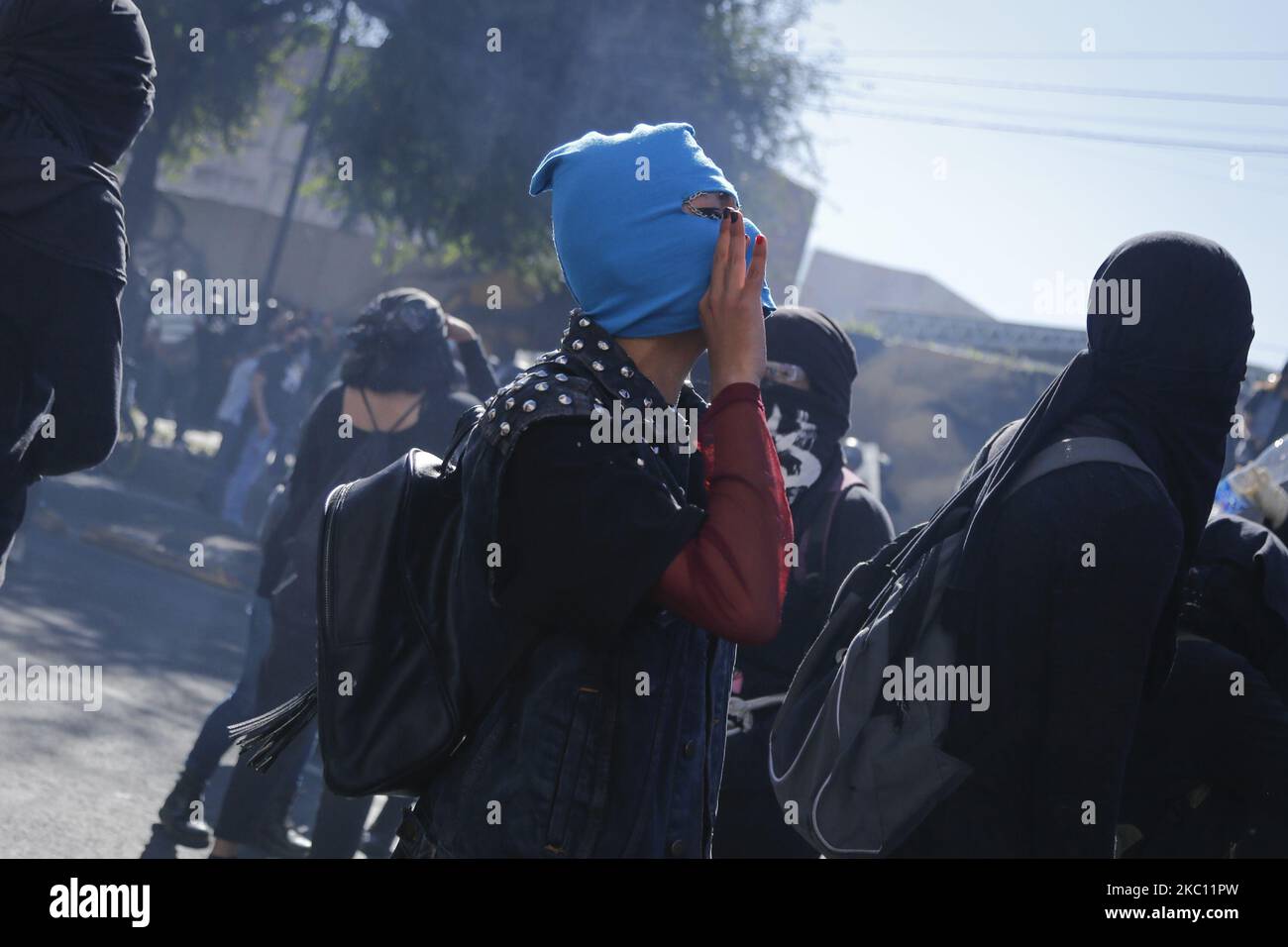 An anarchist shouts to police force during a demonstration on October 2 ...