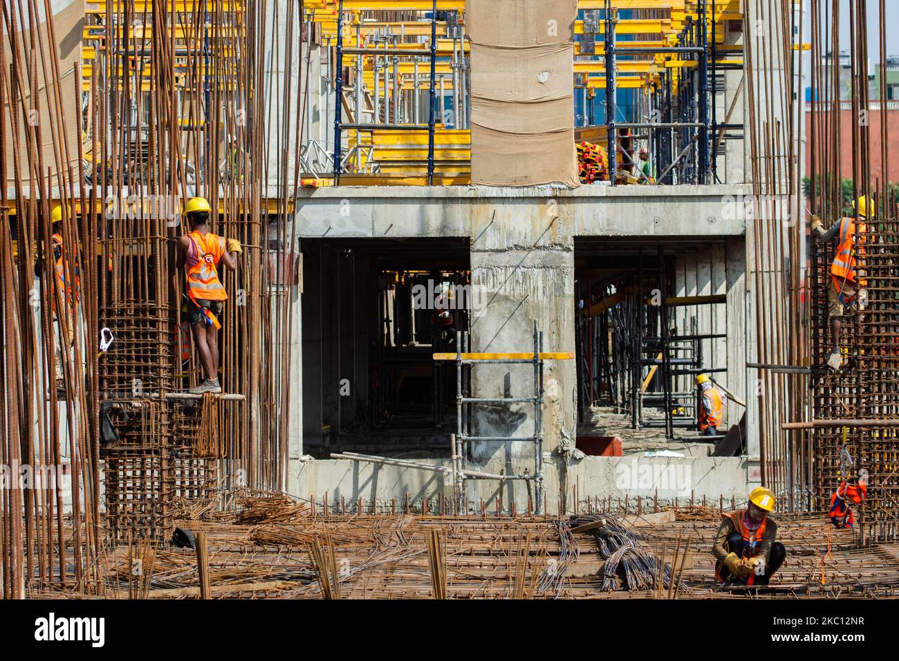Nepalese workers working at a construction site of new federal ...