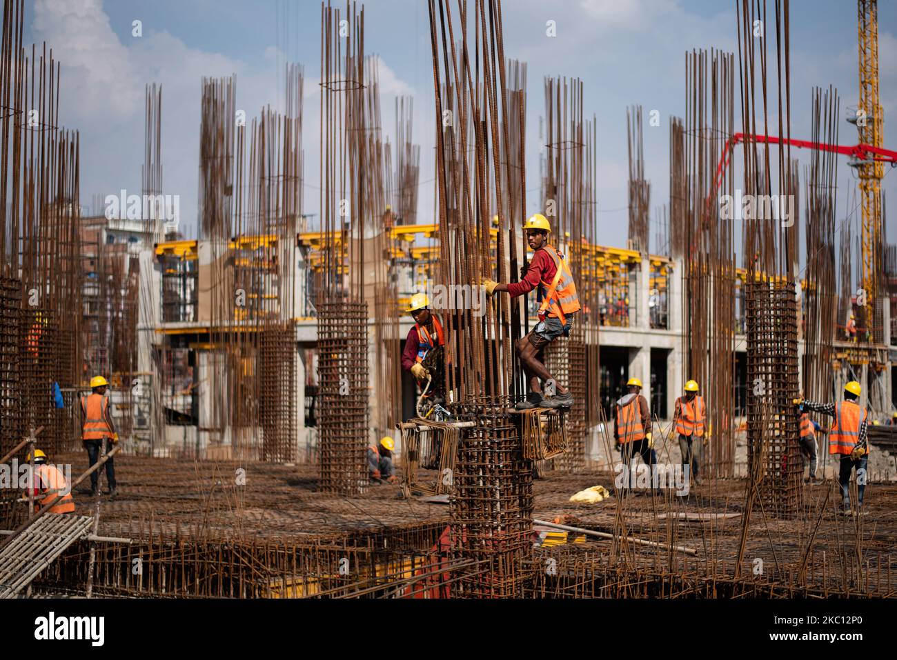 Nepalese workers working at a construction site of new federal ...