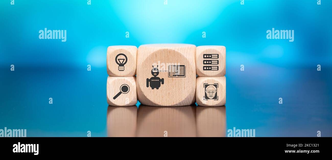 Wooden blocks with symbol of machine learning concept on blue ...