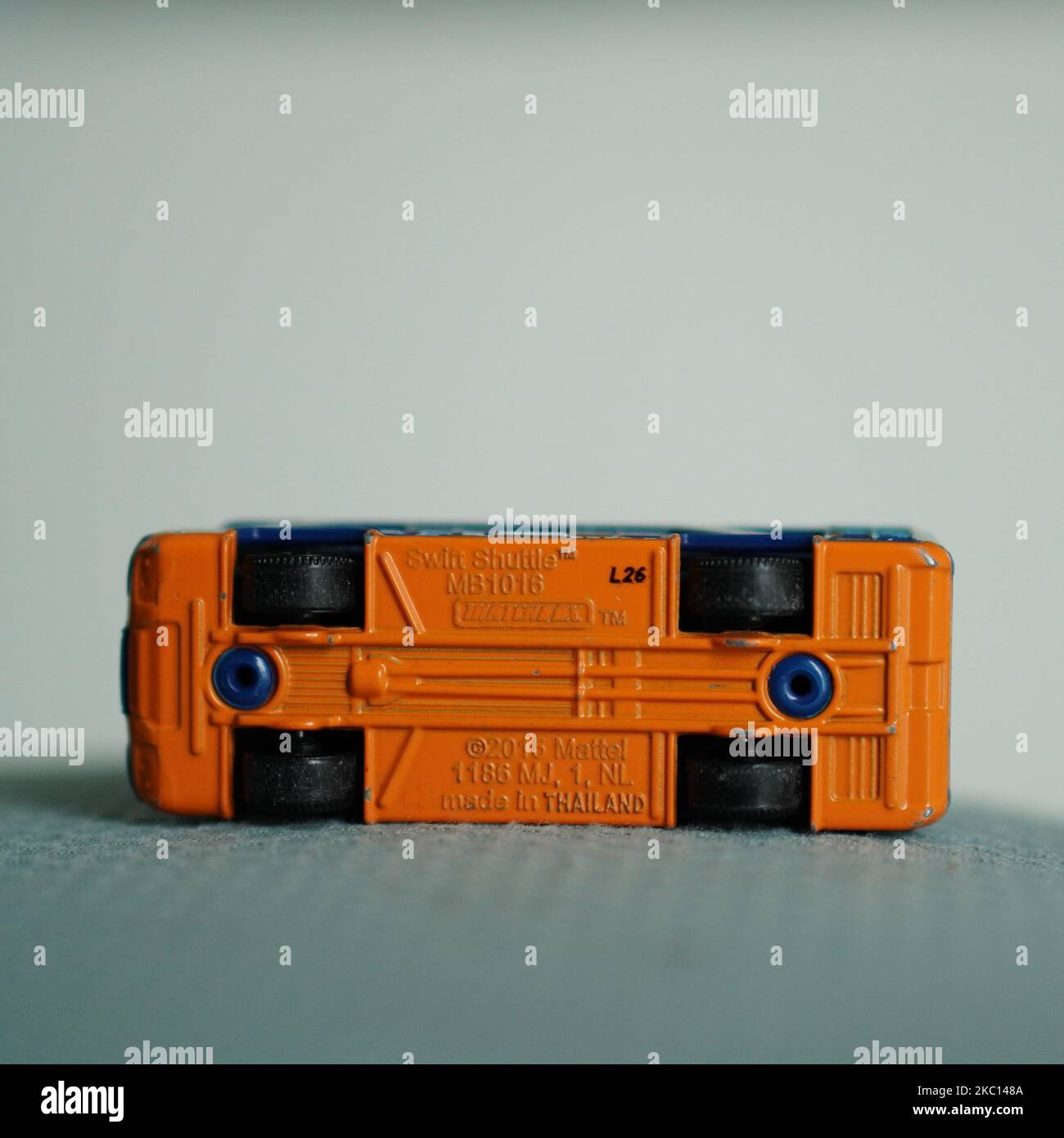 Mattel Matchbox toy model airport bus laying on the side Stock Photo ...