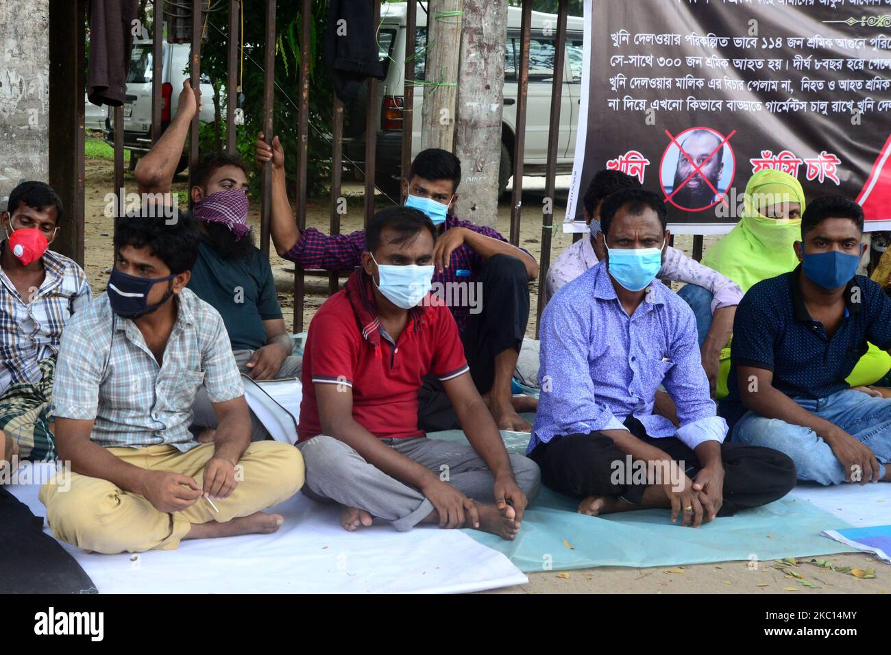 Tazreen garments fires injured workers hi-res stock photography and ...