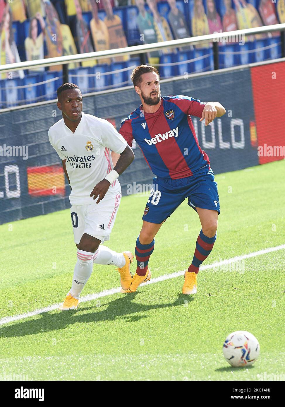 Jorge Miramon of Levante UD and Vinicius Jr of Real Madrid during the ...