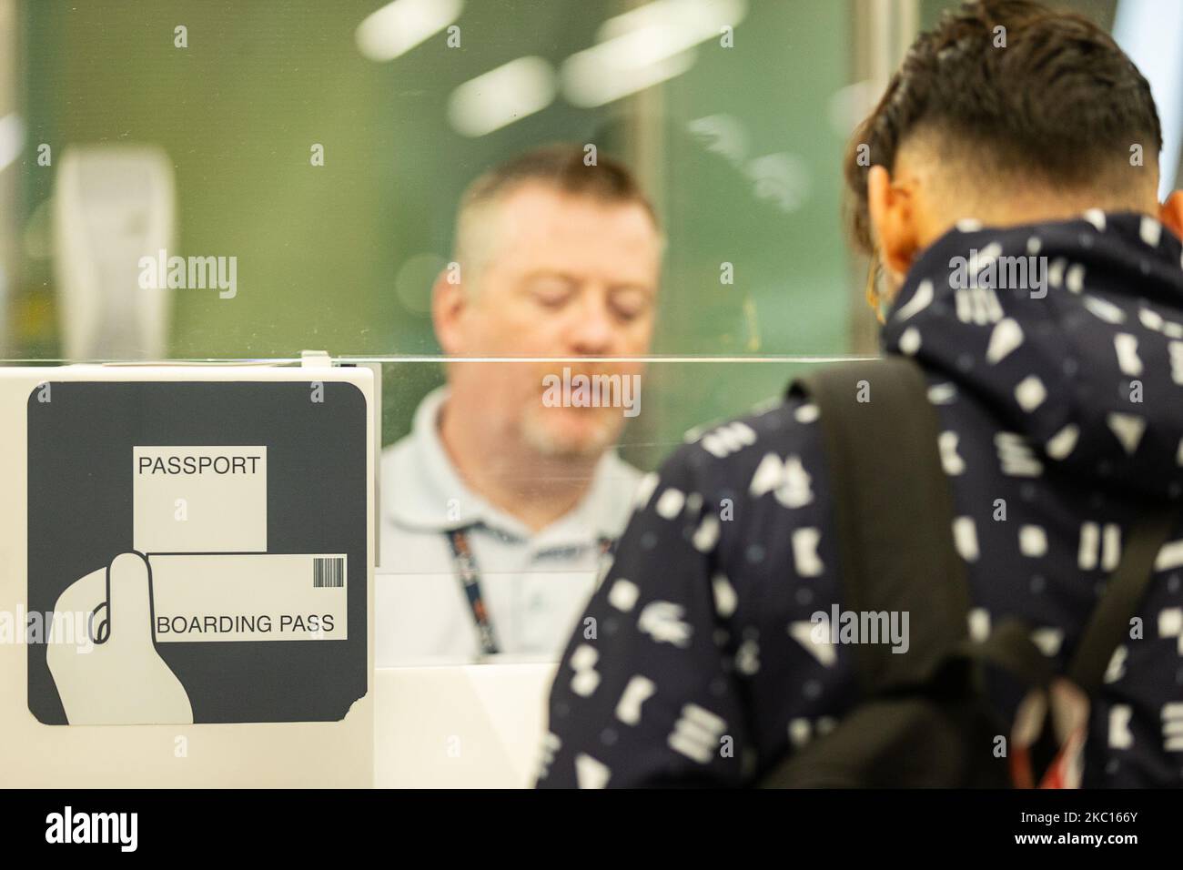 Illustration picture shows a customs officer performing a passport ...