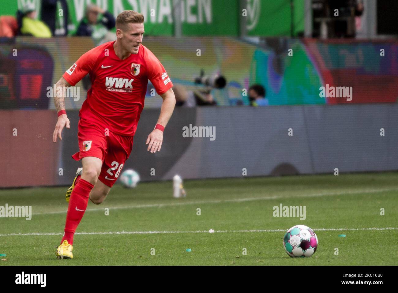 André Hahn of FC Augsburg runs with ball during the Bundesliga match ...
