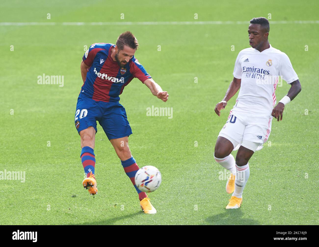 Jorge Miramon of Levante UD and Vinicius Jr of Real Madrid during the ...