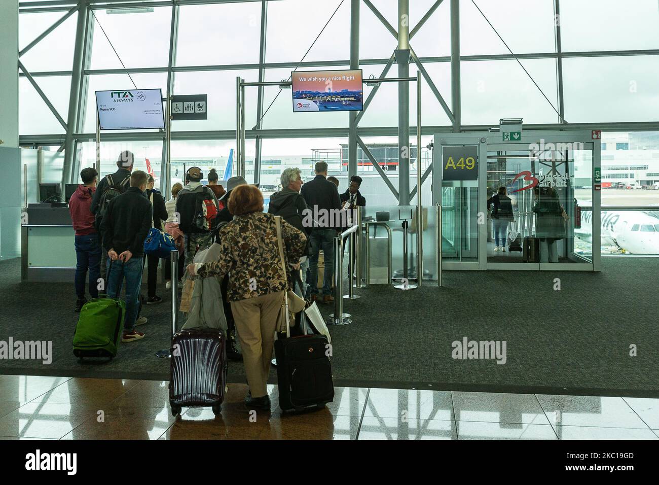 Illustration picture shows people waiting at a gate in terminal A of ...