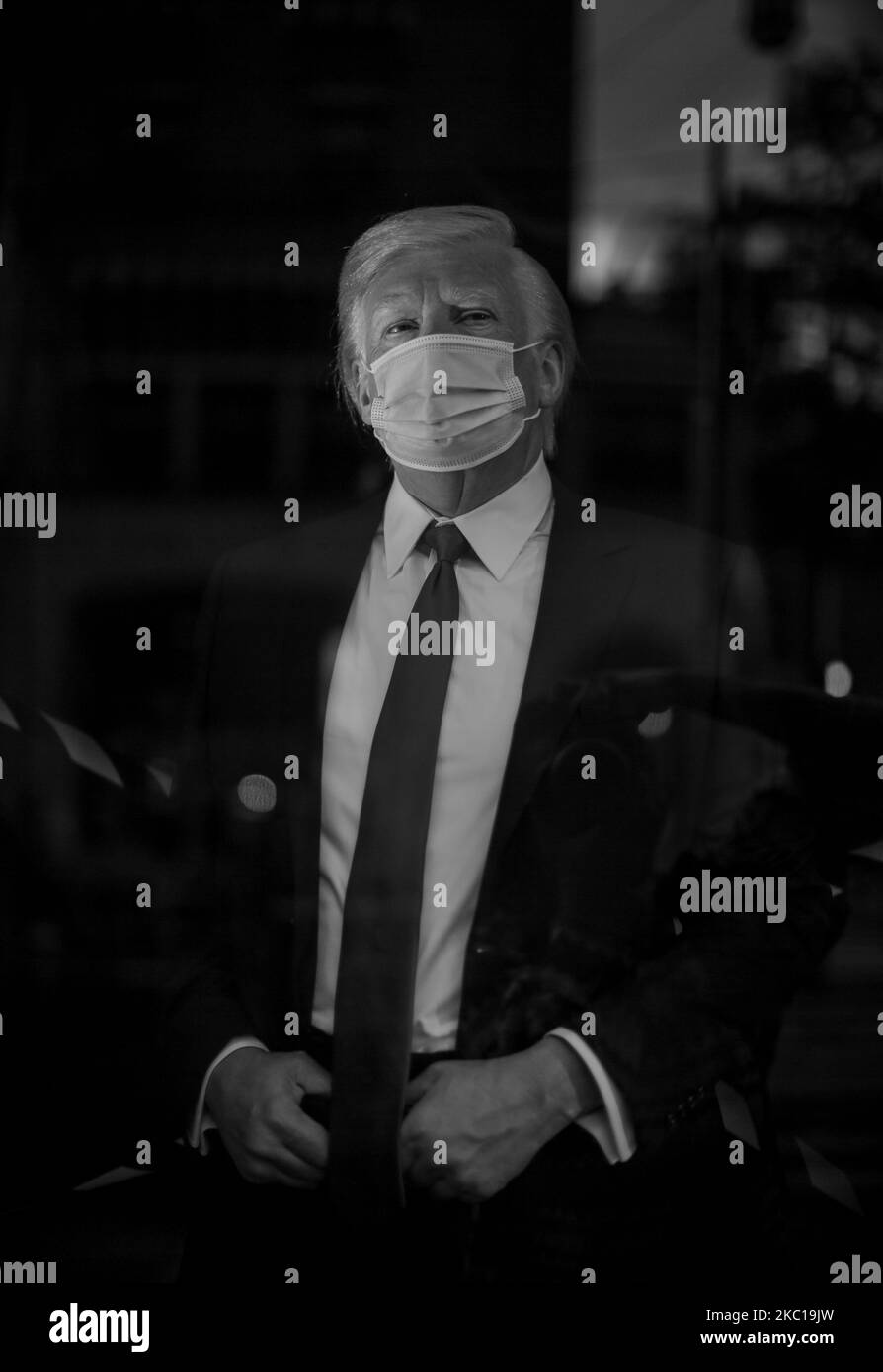 Man wearing trump mask Black and White Stock Photos & Images - Alamy