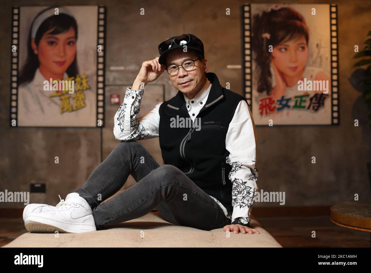 Cinema billboard artist Jimmy Keung Chi-ming photographed with his art ...