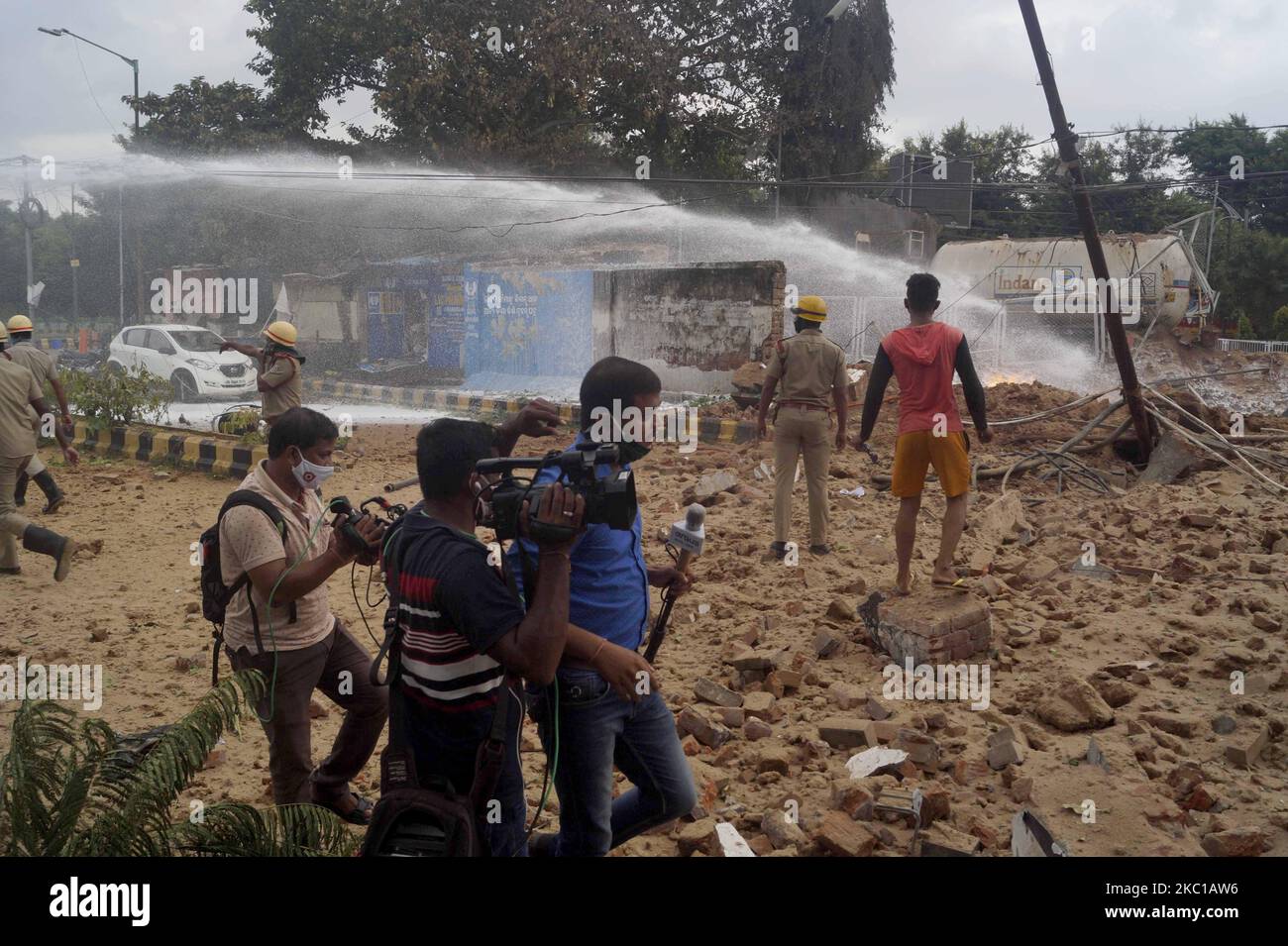 Fire broke out and fire fighters rush to douse the fire after explosion ...