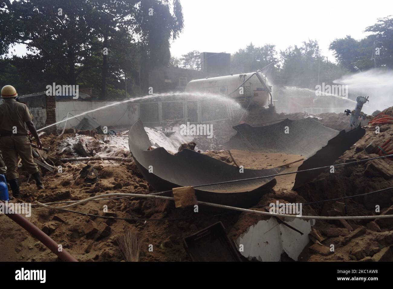 Fire broke out and fire fighters rush to douse the fire after explosion ...