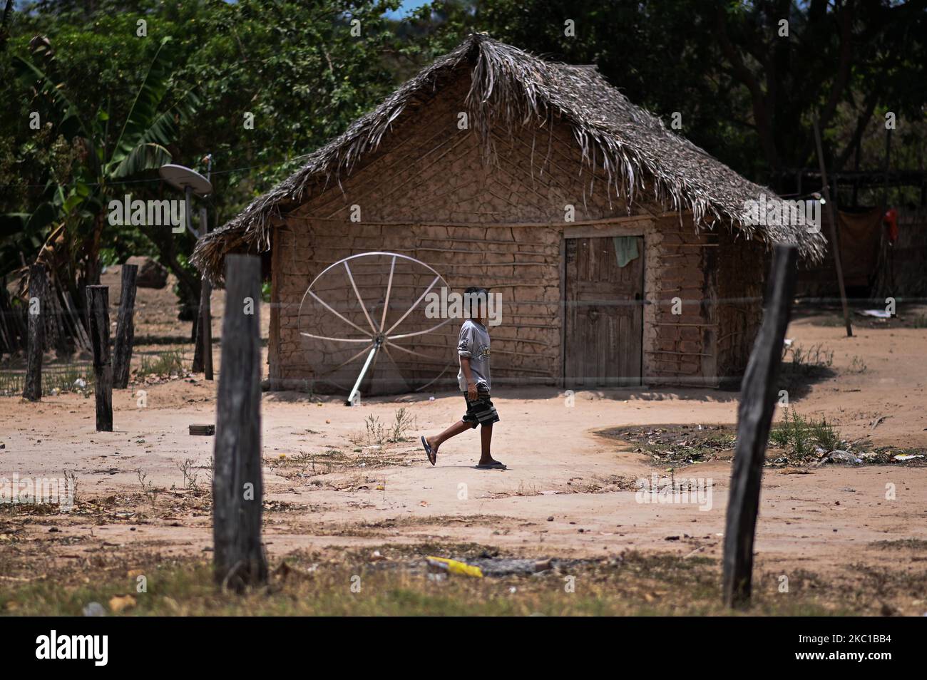 A child from the indigenous Guajajara ethnic group walks, amid the ...