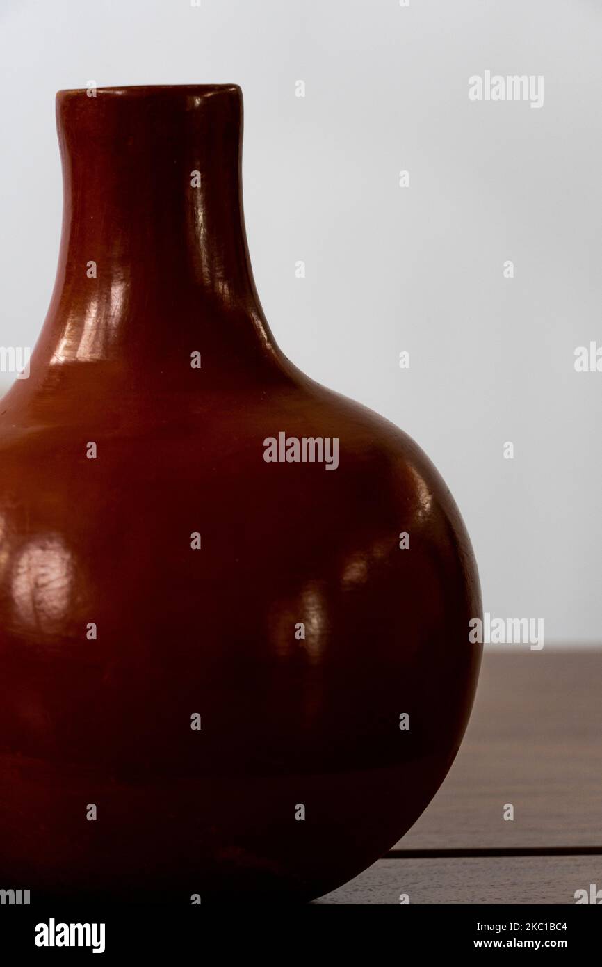 designer wood dining table, minimalist and simple objects on the table ...