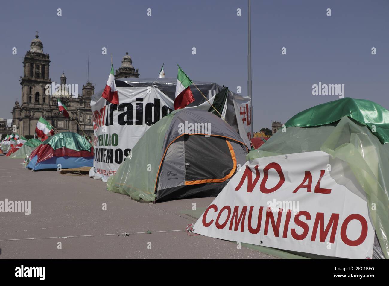 Members of the National Anti-AMLO Front (FRENAAA), continue to sit in ...
