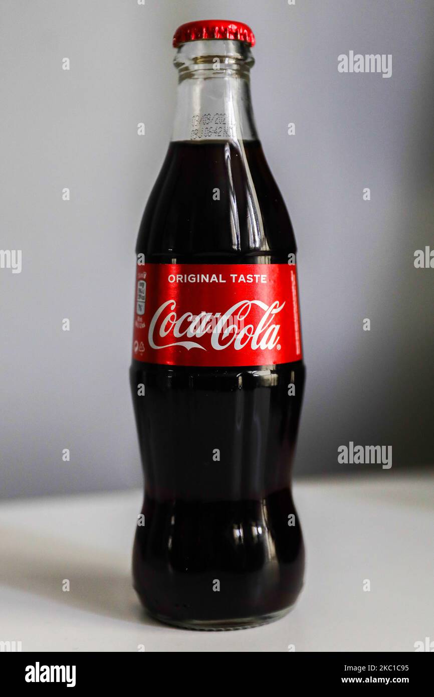 Coca-Cola bottle is seen in this illustration photo taken in Krakow ...